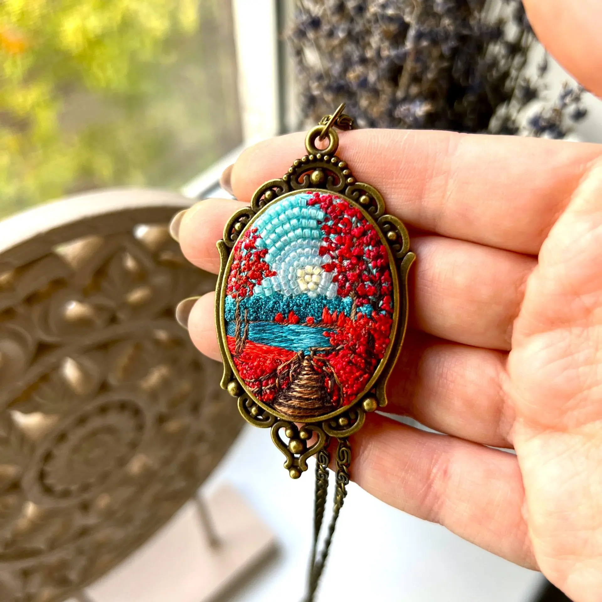 A set of five embroidered pendants, COMMISSIONED WORK - Crealandia