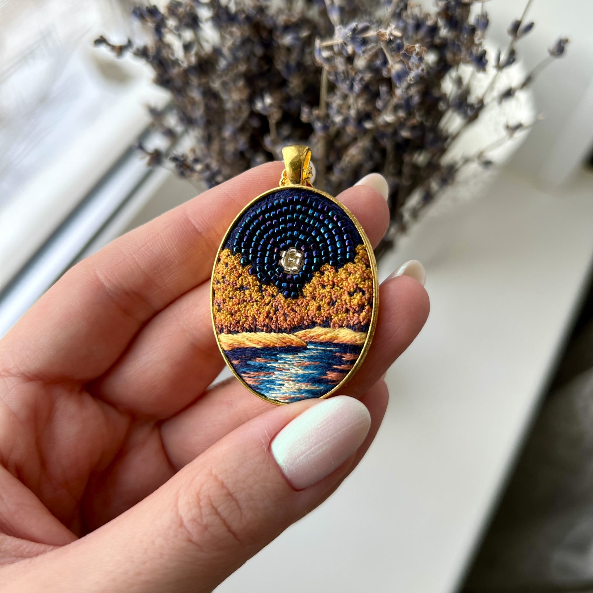 A set of five embroidered pendants, COMMISSIONED WORK - Crealandia