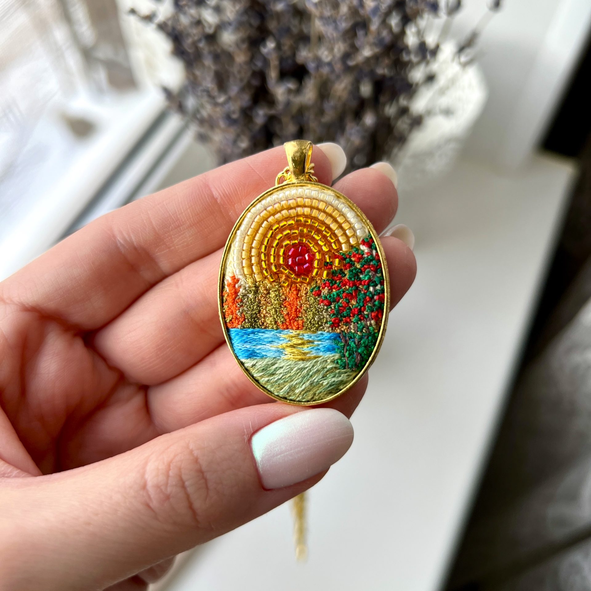 A set of five embroidered pendants, COMMISSIONED WORK - Crealandia