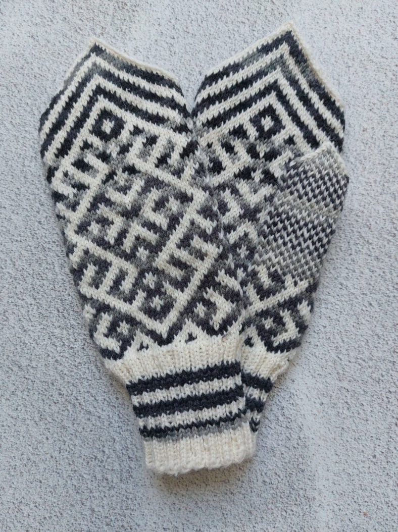 Women's hand-knitted wool mittens are warm with a pattern 3