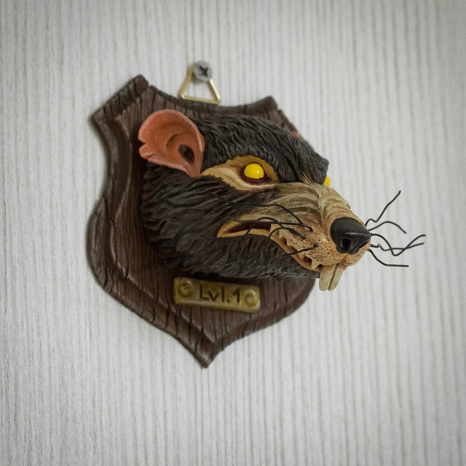 Trophy head of a rat of the first level, souvenir