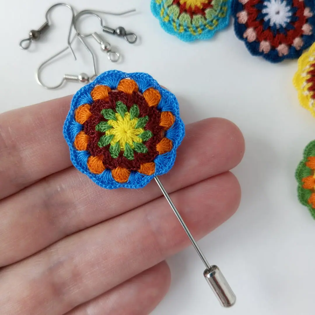 Handcrafted crochet brooch made with micro-crochet technique