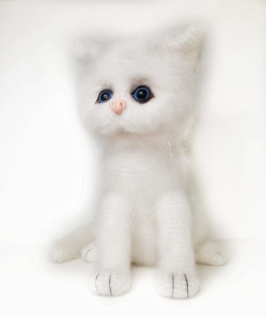 Realistic stuffed White cat
