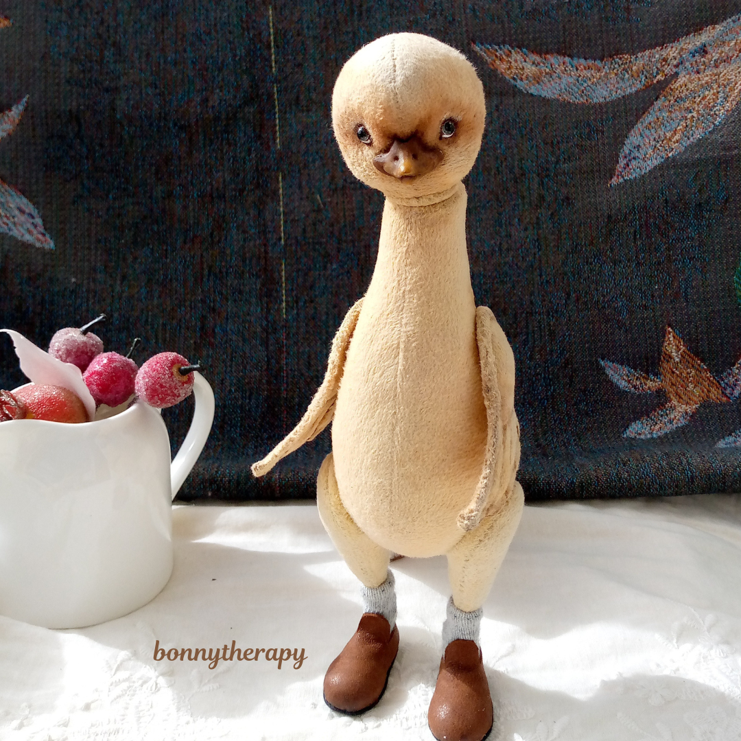 Cute teddy duckling in clothes, duck art doll