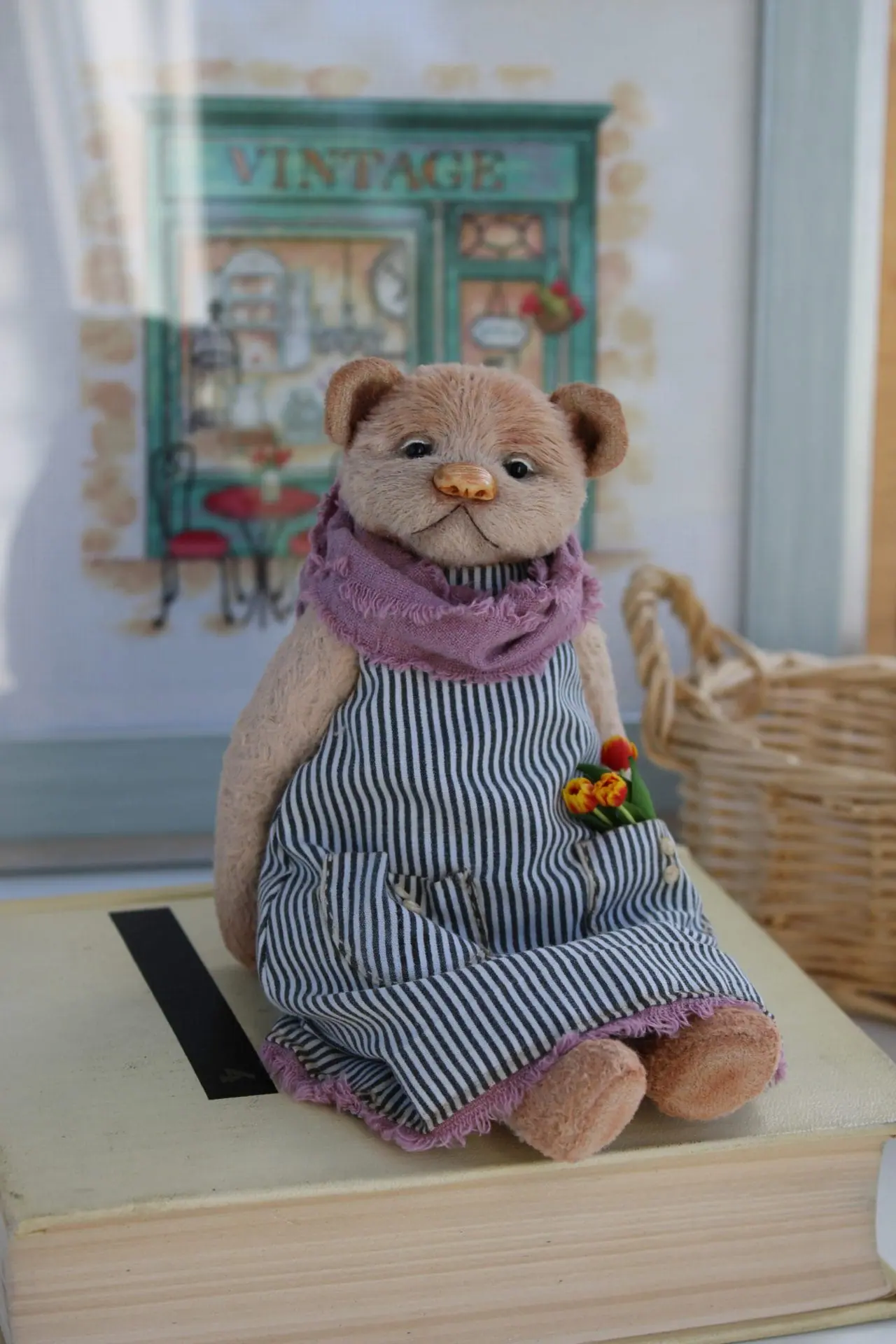 A teddy bear of the author's work - DailyDoll Shopteddy